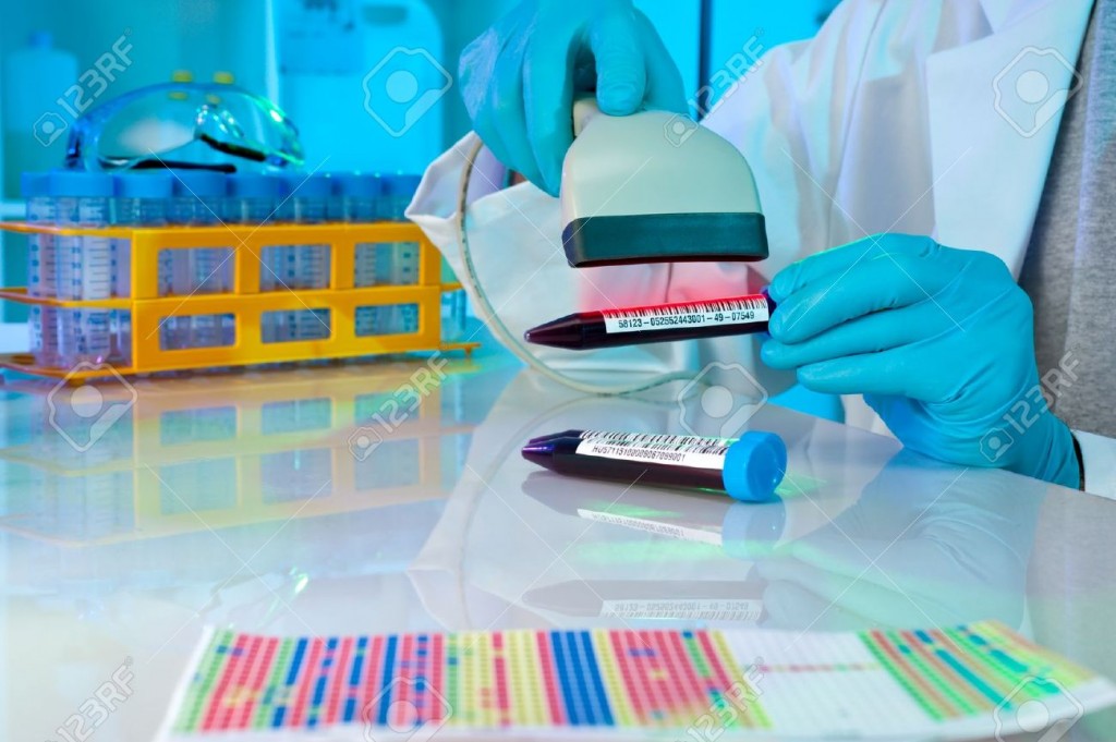 14866318-Scanning-barcodes-on-medical-samples-Stock-Photo - Ginmaro ...